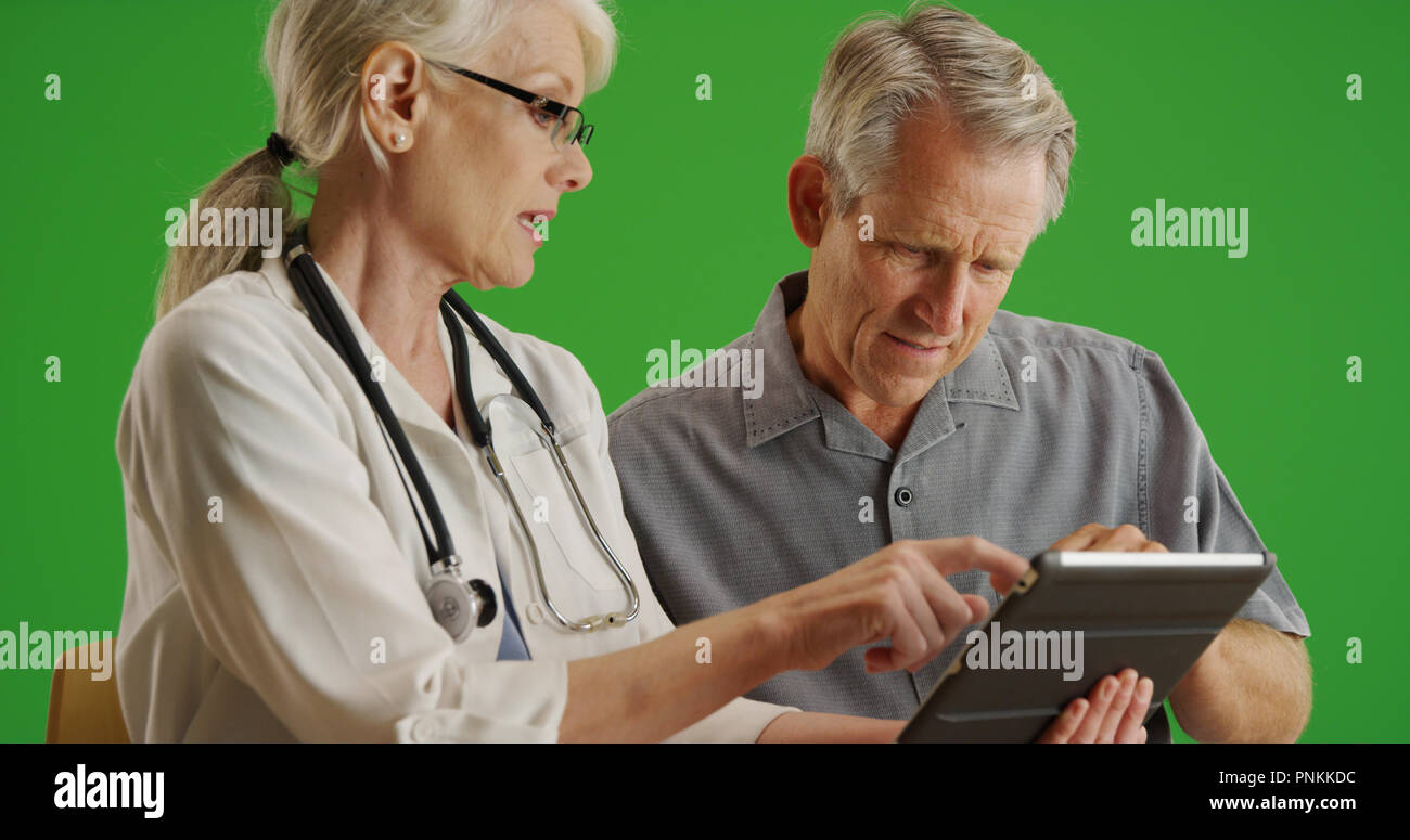Doctor advising male patient hi-res stock photography and images - Alamy
