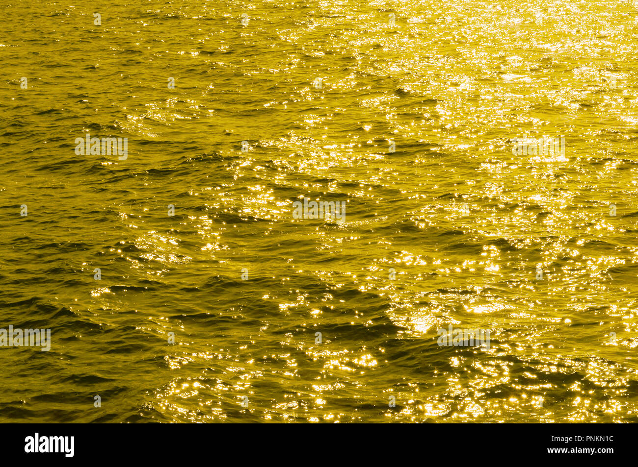 yellow tone, background water surface, ripple on the water Stock Photo ...