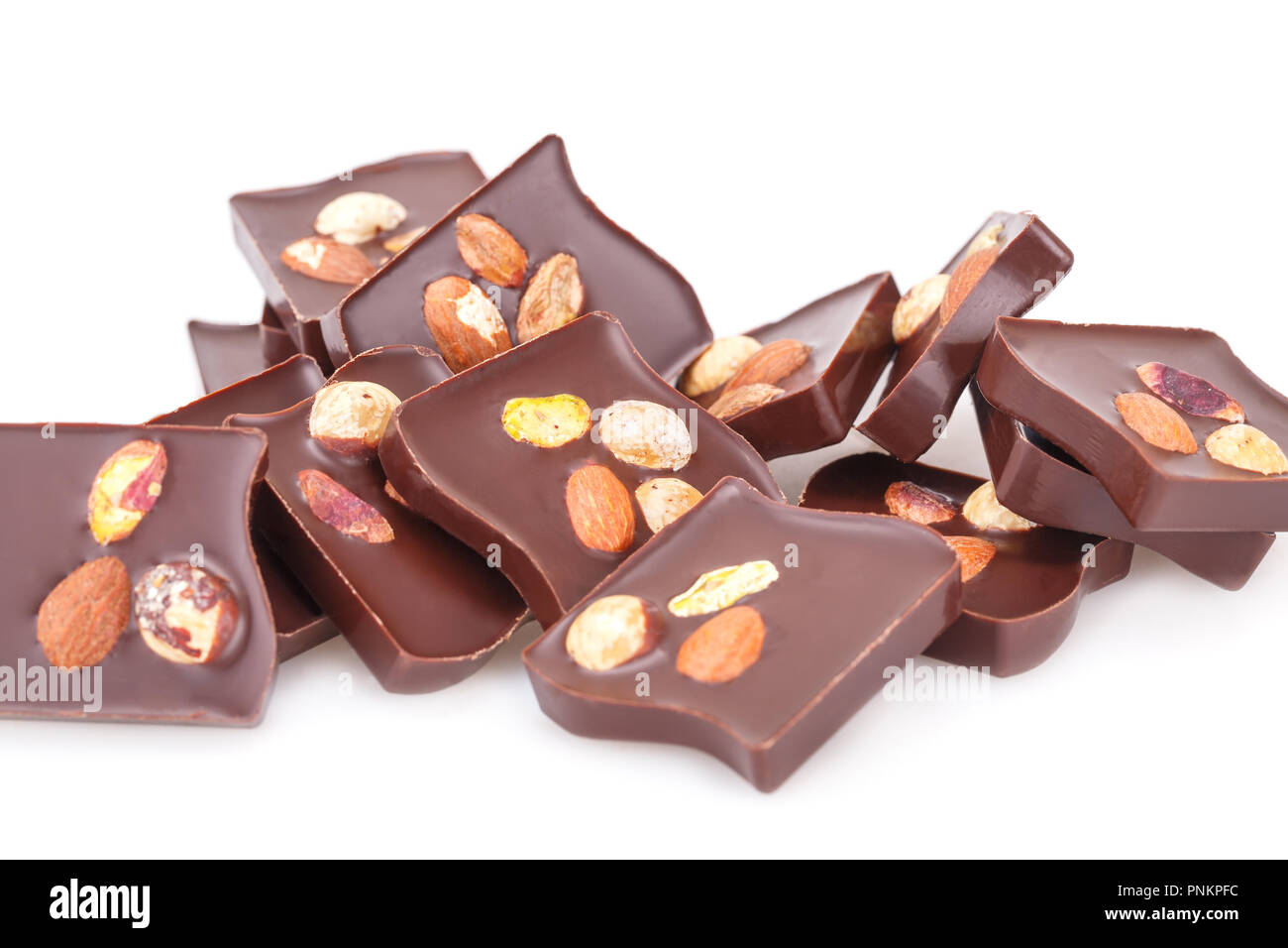 Heap of chocolate isolated on white background Stock Photo - Alamy