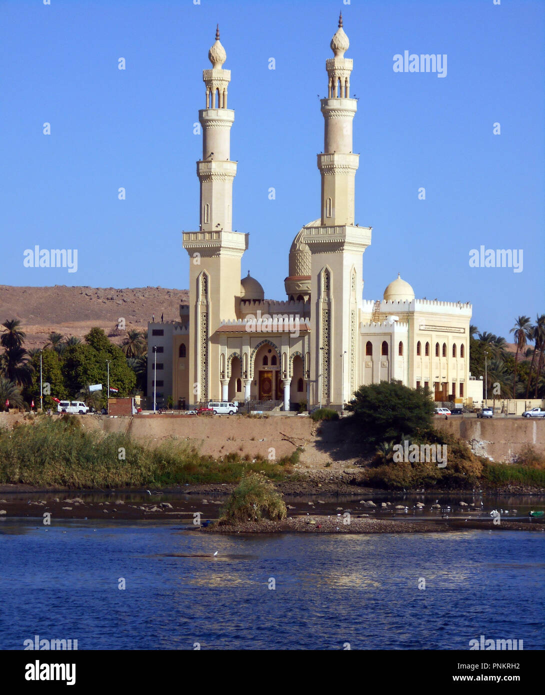 A beautiful and elegant mosque sits on the banks of the River Nile in ...