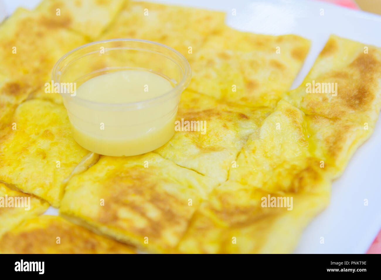 roti with Sweetened Condensed Milk Stock Photo - Alamy