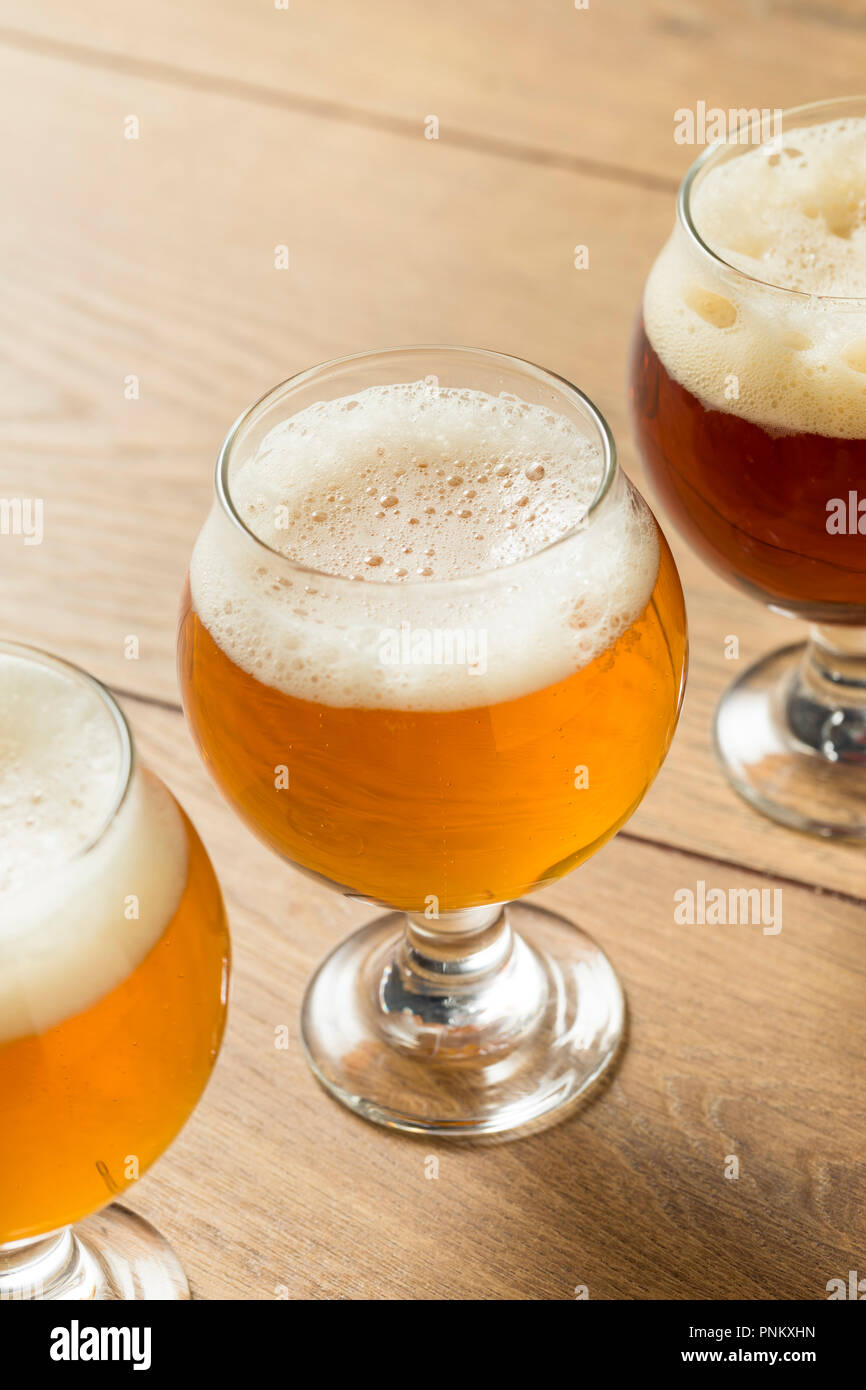 Refreshing Cold Beer Flight with Lager IPA and Porter Stock Photo - Alamy