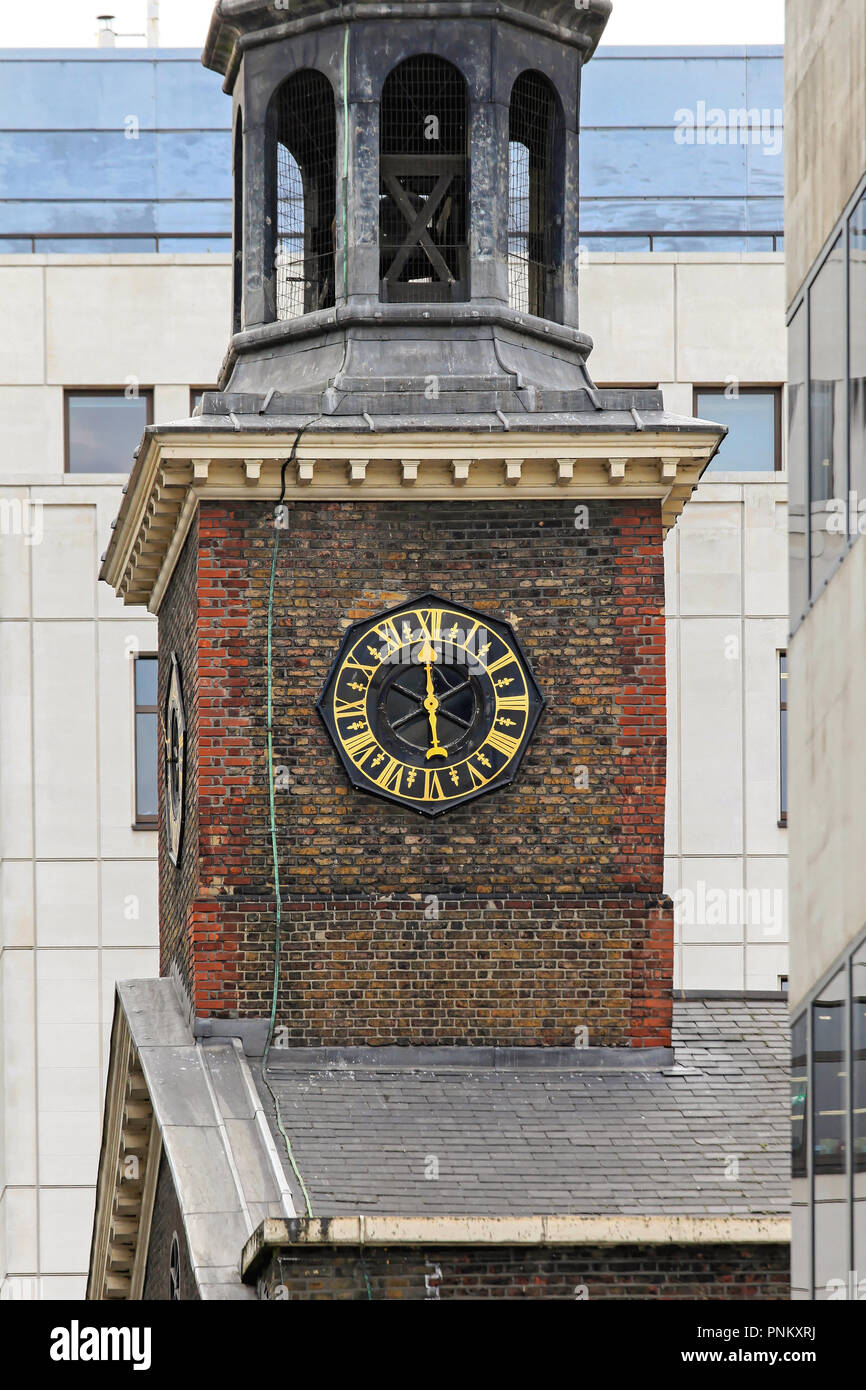 Church tower clock in East London Stock Photo - Alamy