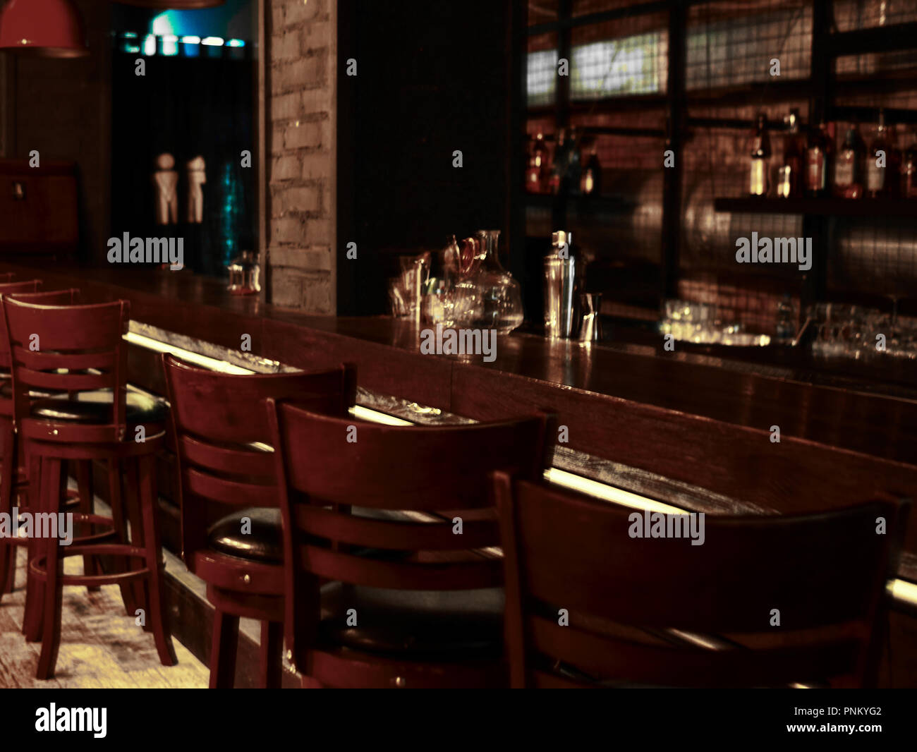 Modern jazz bar interior design, stage with black piano and cello ...