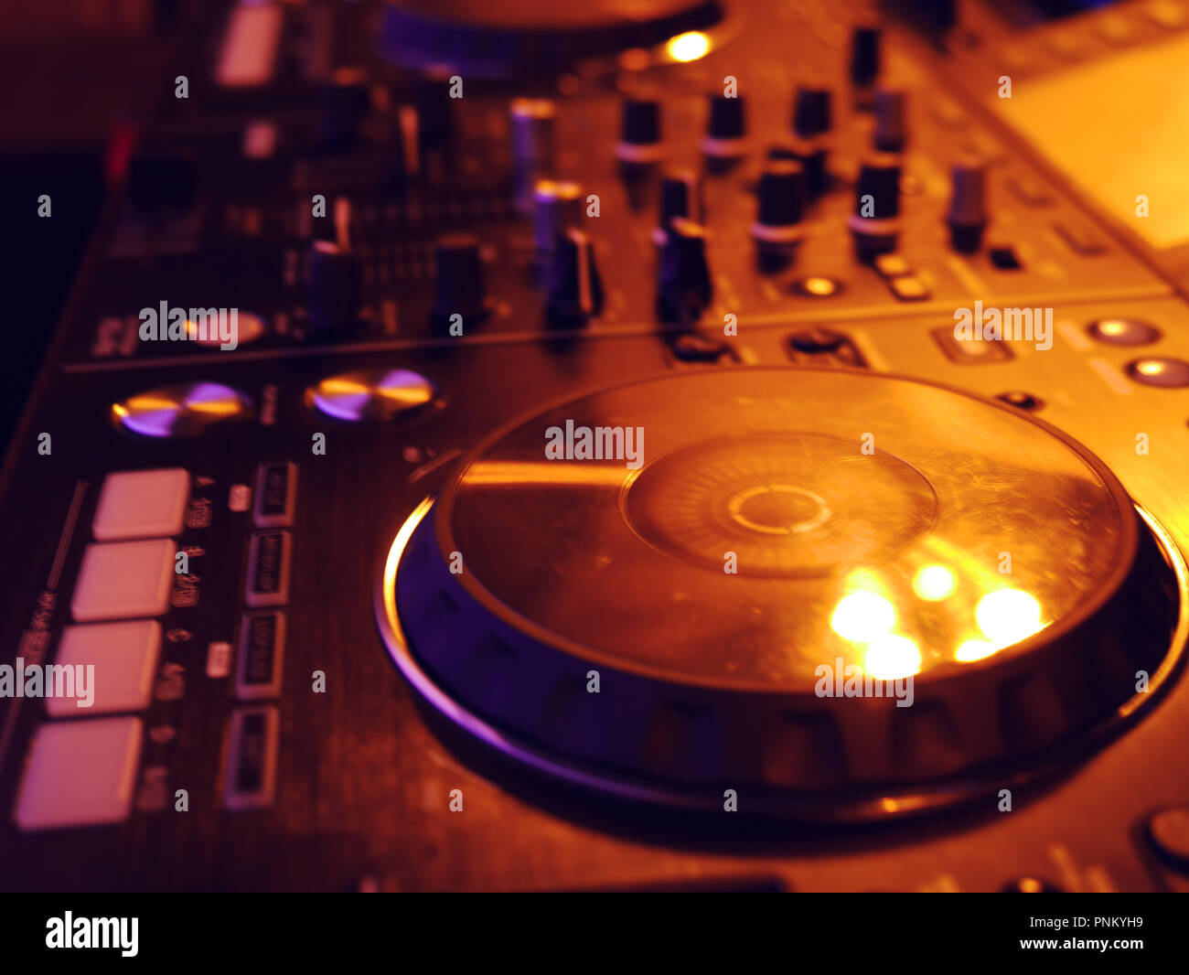 Sound mixing console detail, close up. DJ professional music console ...