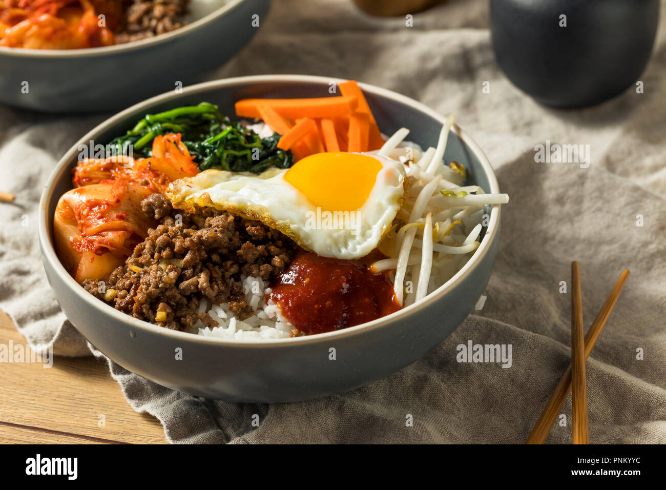 Spicy Homemade Korean Bibimbap Rice with Egg and Beef Stock Photo - Alamy