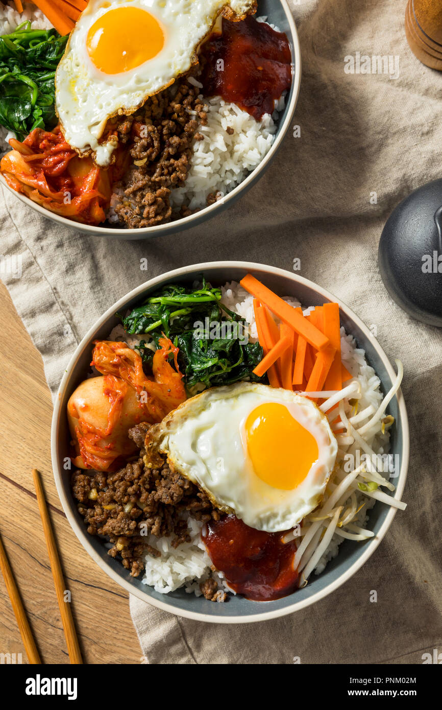 Spicy Homemade Korean Bibimbap Rice with Egg and Beef Stock Photo - Alamy