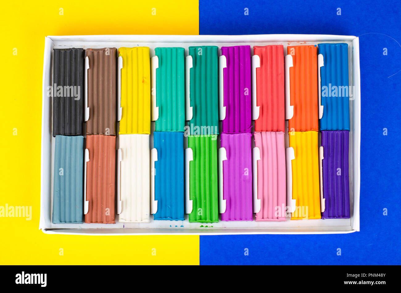 Colored plasticine for molding in box. Studio Photo Stock Photo - Alamy