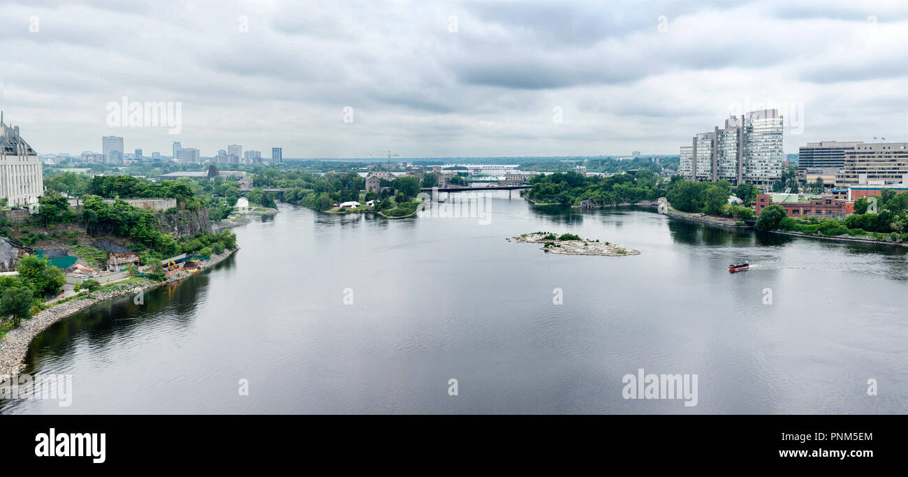 Ottawa, a panorama of a navigable river with embankments and bridges ...