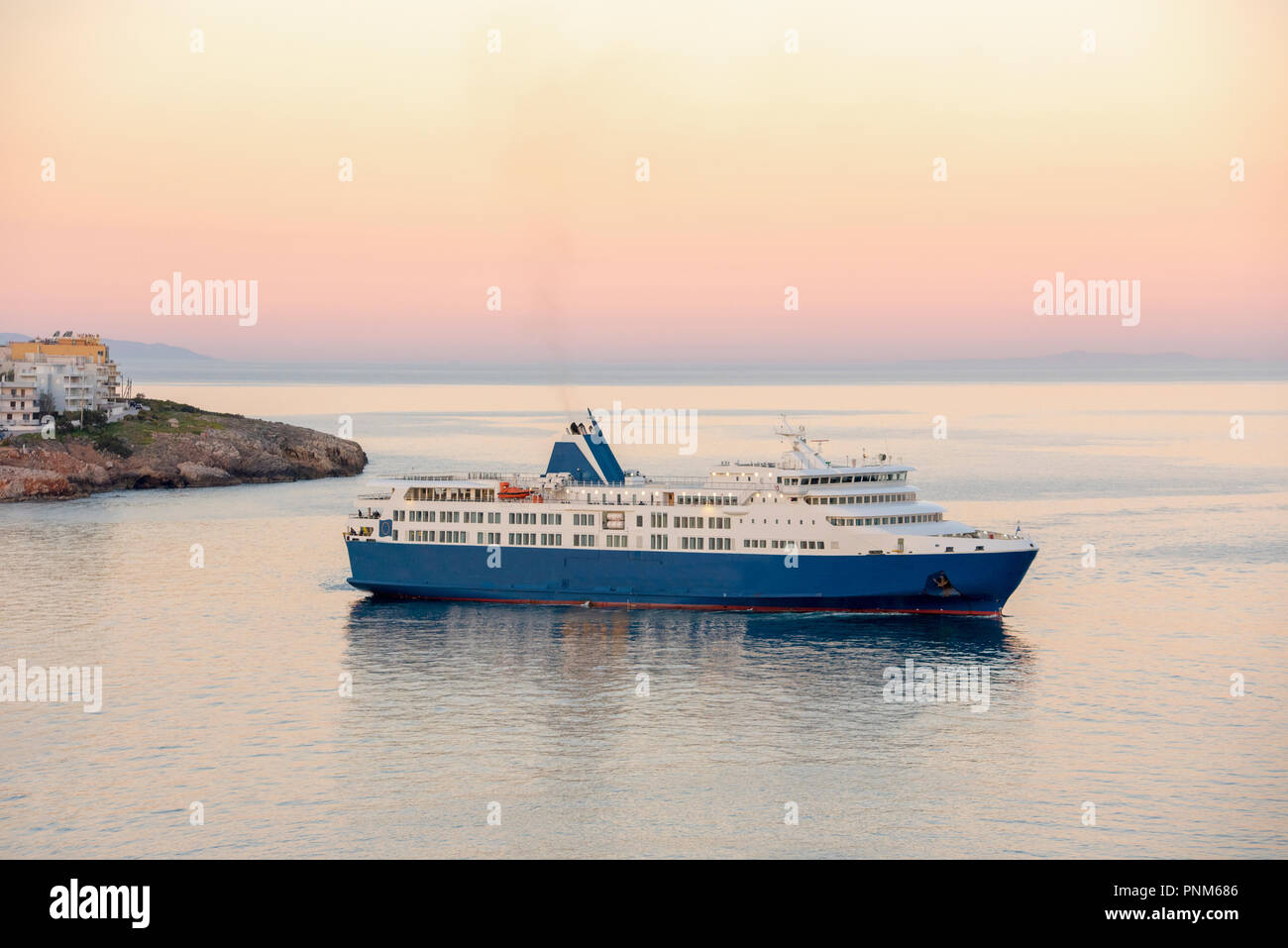 A blue white ferry boat travel from port of Rafina to aegean islands ...