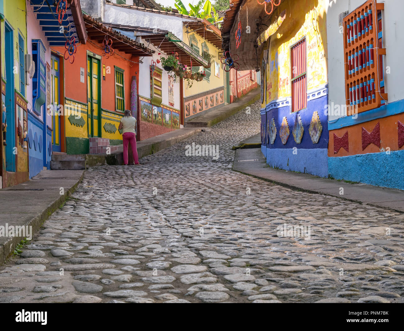 Colorful decorated houses in Guatape village, Colombia Stock Photo - Alamy