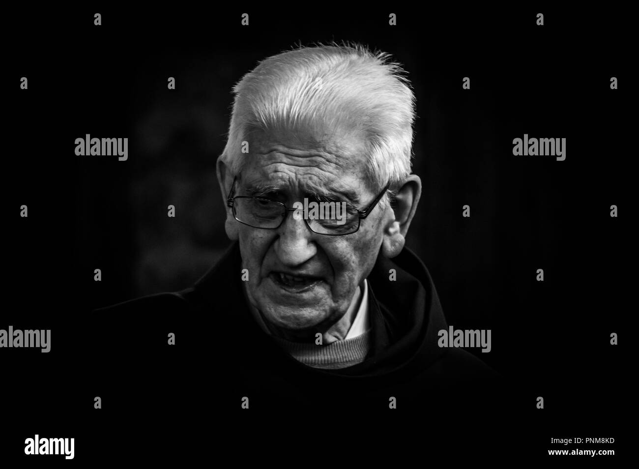 An Elder Monk in the Sanctuary Stock Photo - Alamy