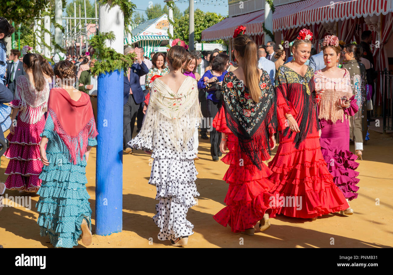 Spanish Women With Colorful Flamenco Dresses Feria De Abril Sevilla spanish-women-with-colorful-flamenco-dresses-feria-de-abril-sevilla