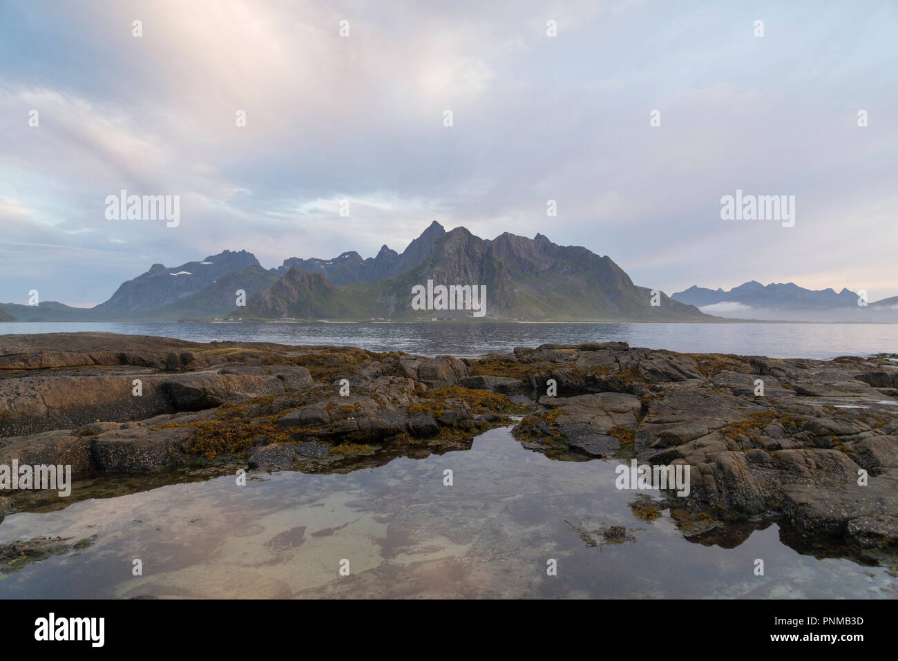 Village of Flakstad seen from across the fjord, Lofoten Islands, Norway ...