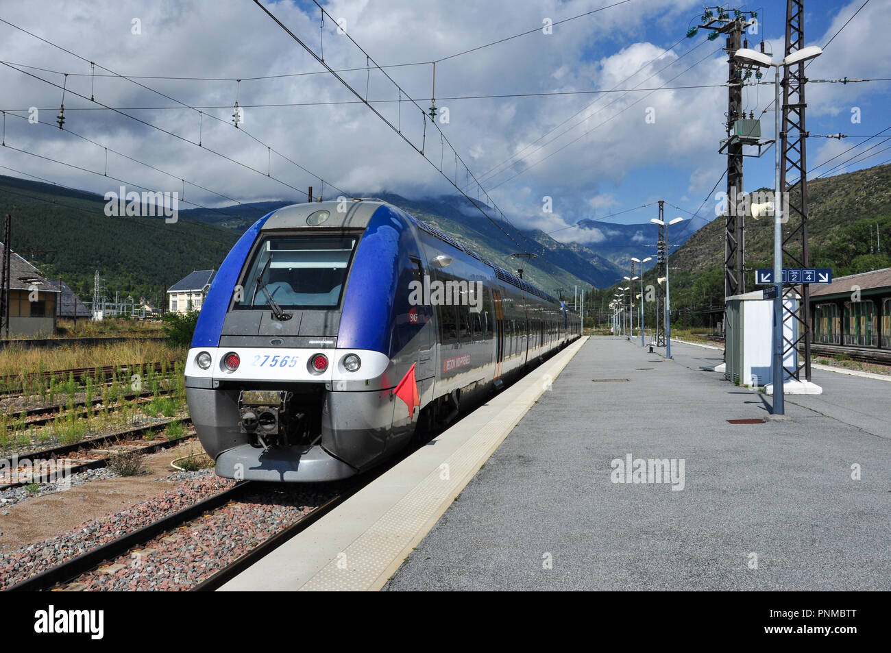 Passenger train at the station in Latour-de-Carol, Pyrenees-Orientales ...