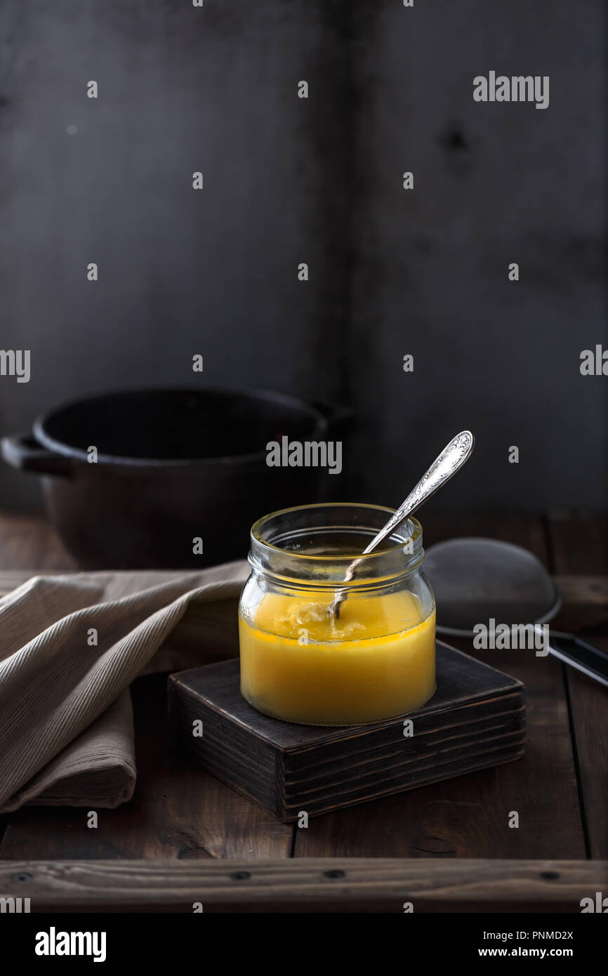 A jar of ghee or clarified butter, copy space Stock Photo - Alamy