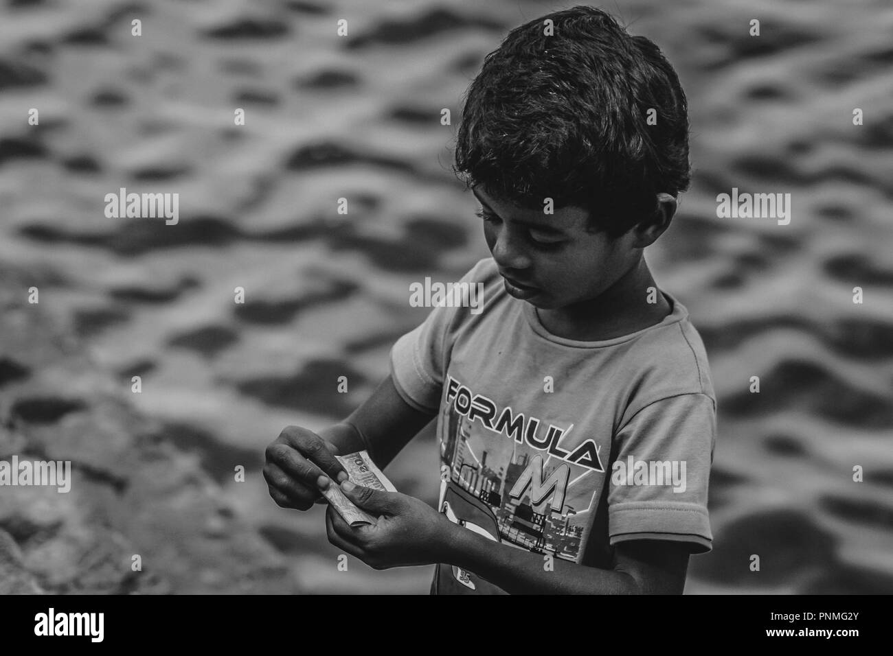 Child counting money Black and White Stock Photos & Images - Alamy