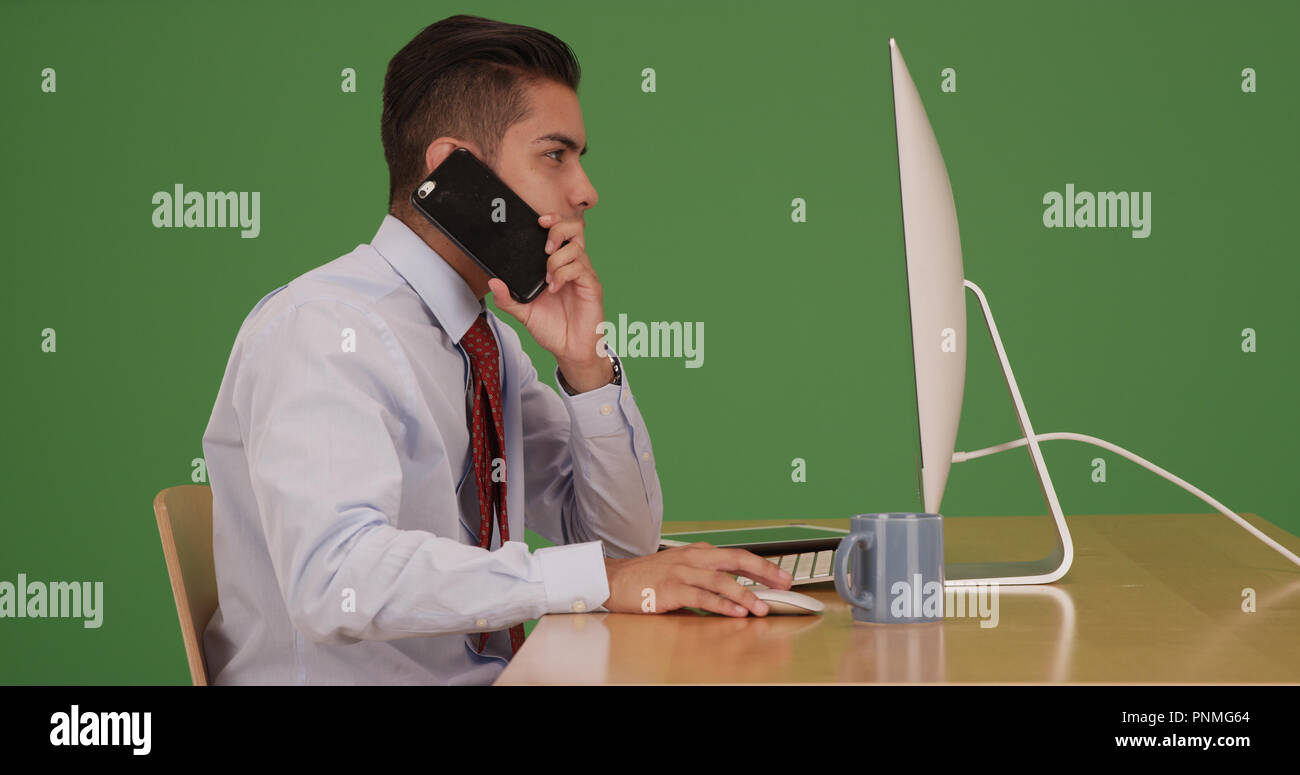 Latino businessman talking client hi-res stock photography and images ...