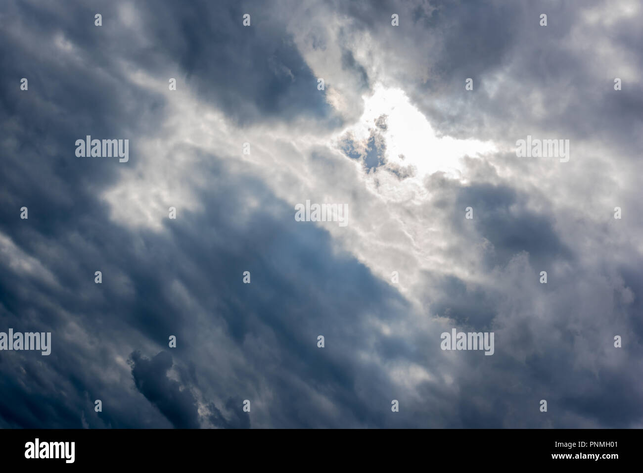 A being comes down from the stormy sky Stock Photo - Alamy