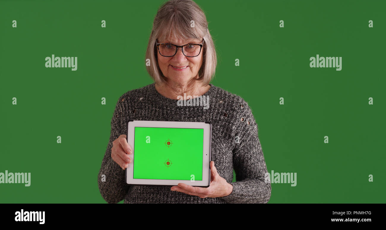 Female holding green screen display hi-res stock photography and images ...