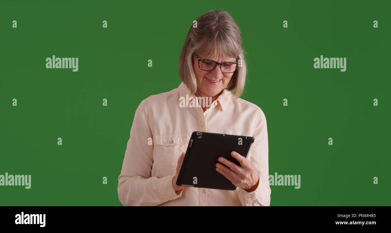 Woman swiping up green screen hi-res stock photography and images - Alamy