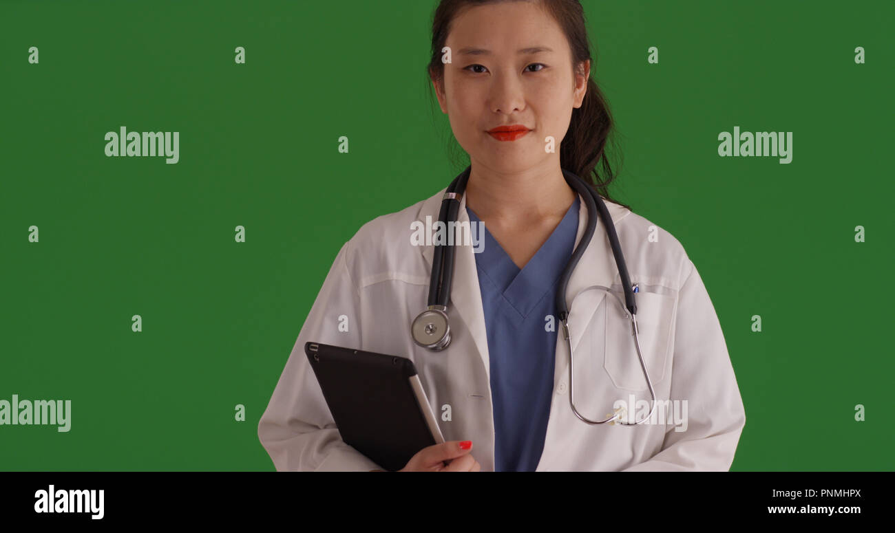 Female asian doctor green screen hi-res stock photography and images ...