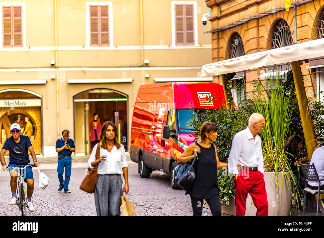 RAVENNA, ITALY - SEPTEMBER 19, 2018: light enlightening BRT logo on red ...