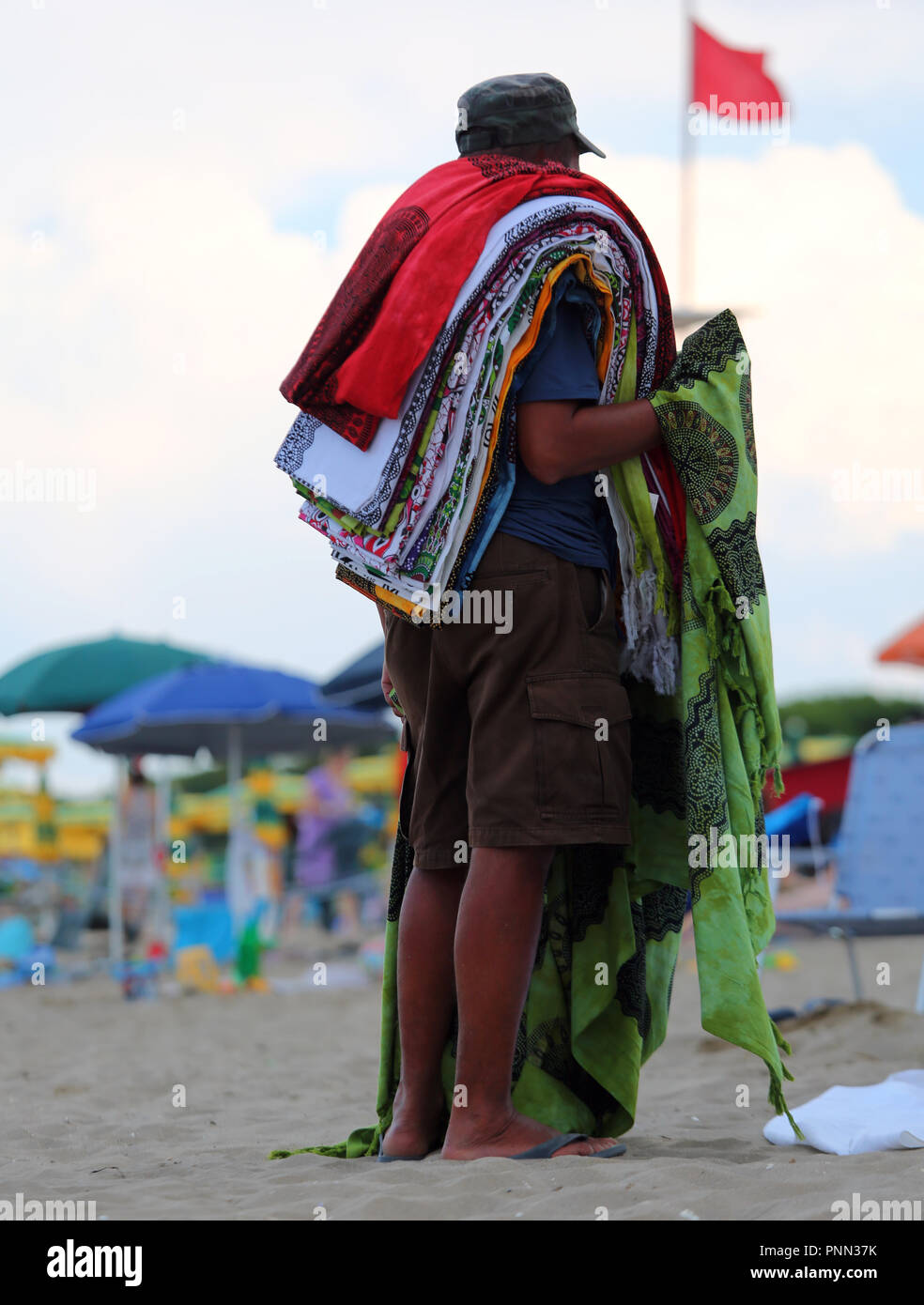 african hawker on the beach in summer Stock Photo - Alamy