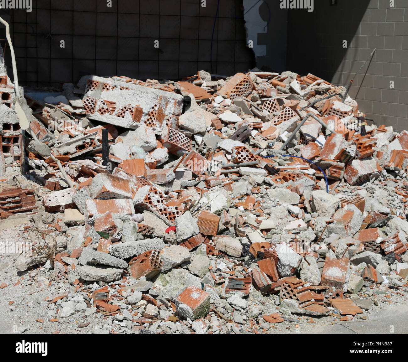 many debris of a demolished house with bricks and mortar Stock Photo ...