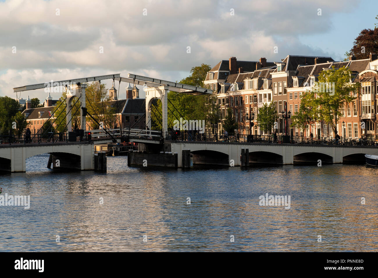 One of Amsterdam's many bridges is the beautiful Magere Brug (Skinny ...