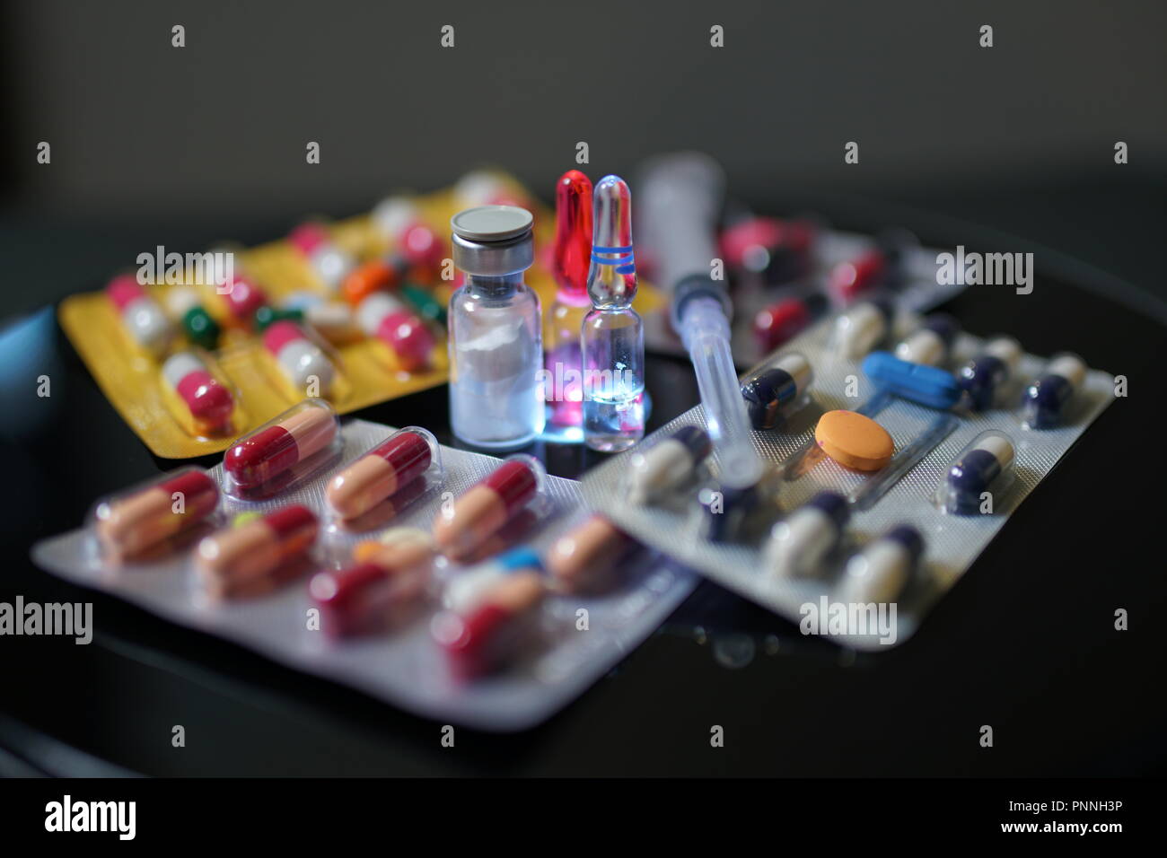 Pills and drugs. Medicine, capsules in blister, tablets, injection ...