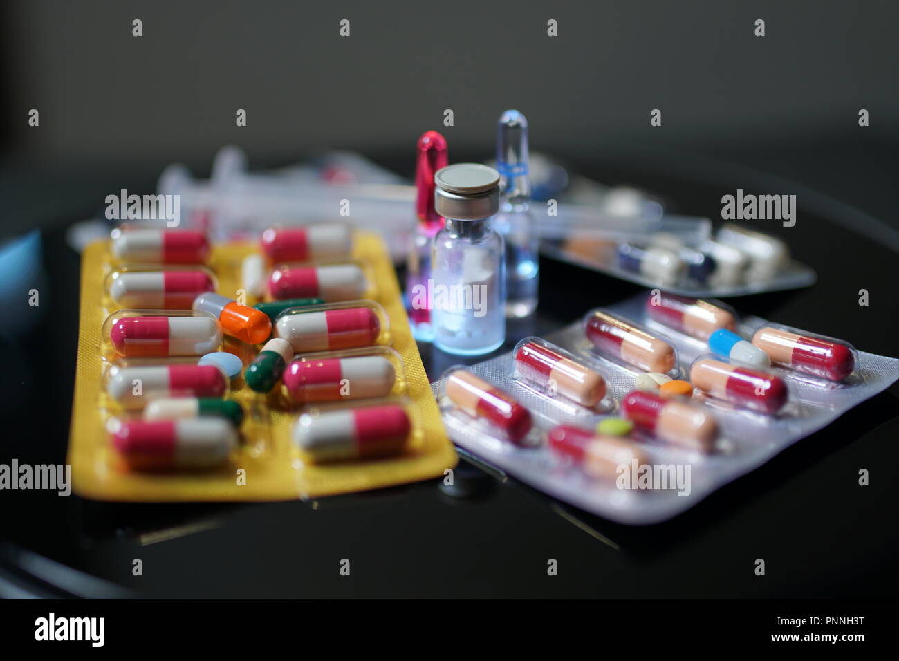 Pills and drugs. Medicine, capsules in blister, tablets, injection ...