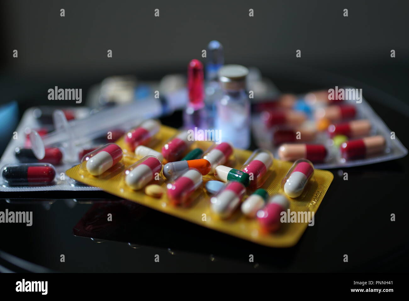 Pills and drugs. Medicine, capsules in blister, tablets, injection ...