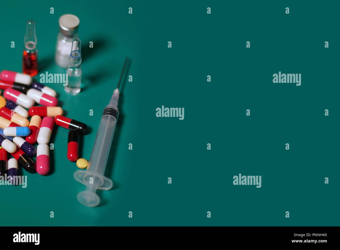 Medication capsules in an opened prescription bottle. Medicine ...