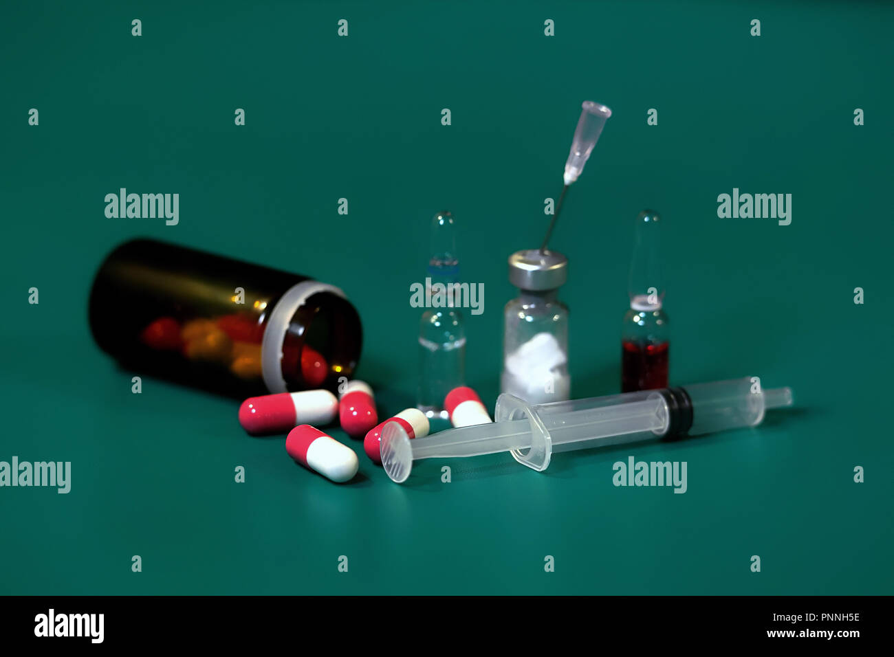Medication capsules in an opened prescription bottle. Medicine ...