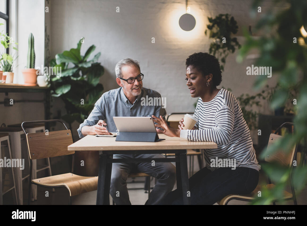 Coworkers writing hi-res stock photography and images - Alamy