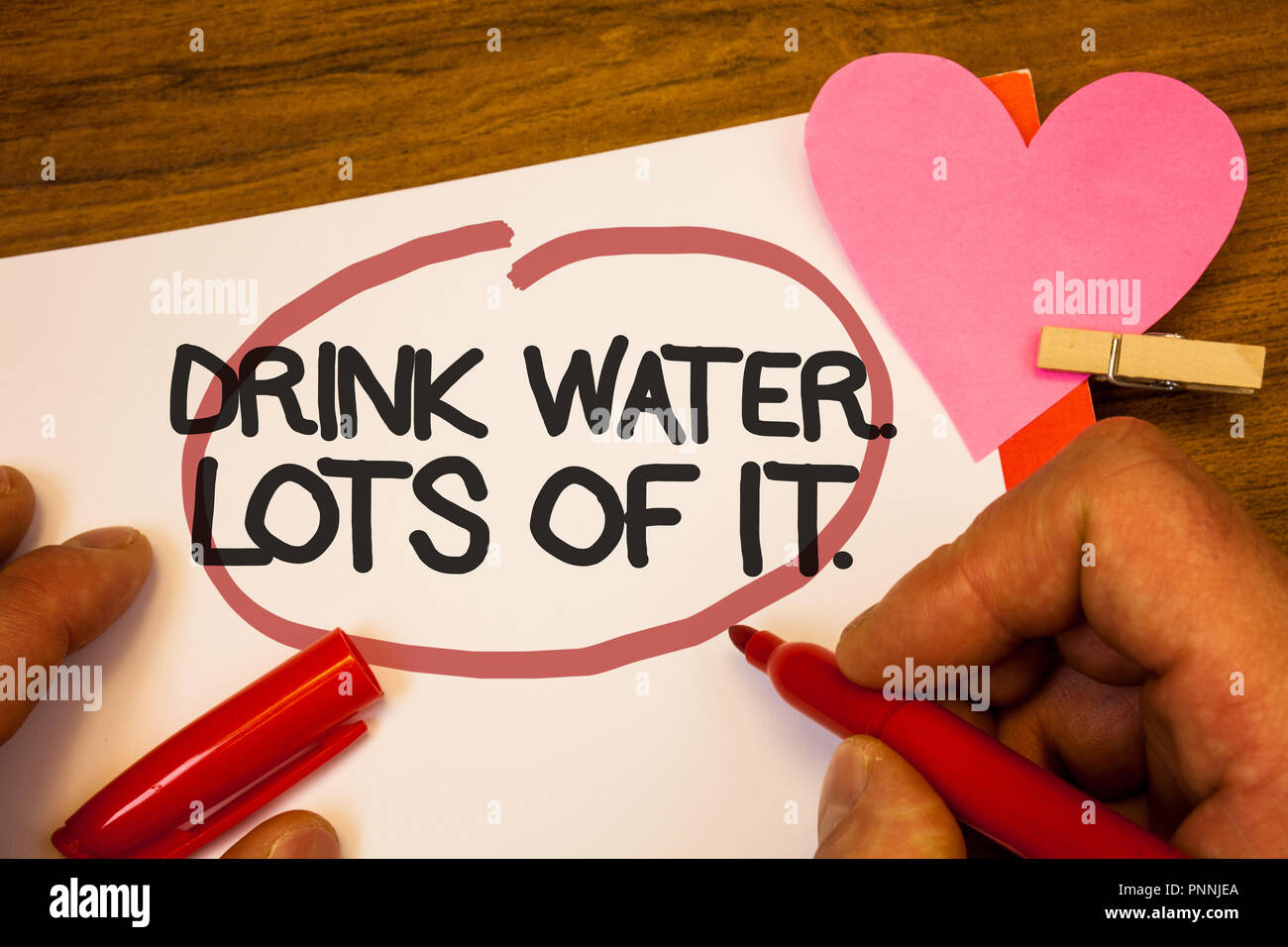 Handwriting text Drink Water. Lots Of It. Concept meaning drinking ...
