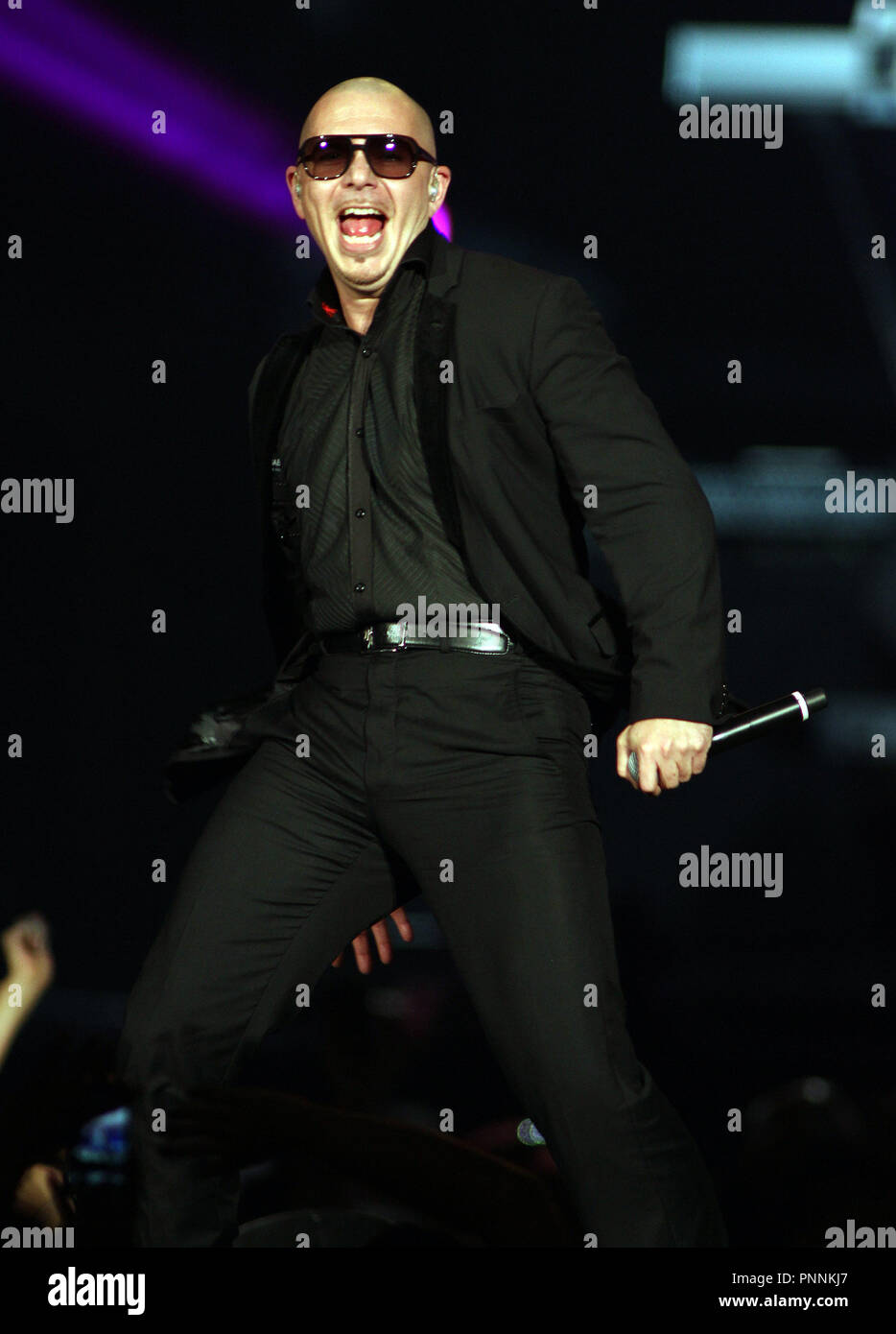 Pitbull performs in concert at the American Airlines Arena in Miami on ...