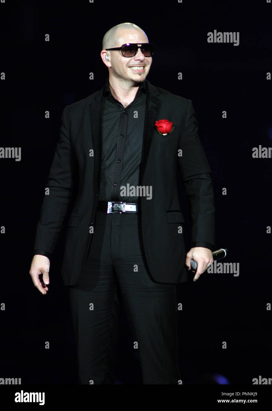 Pitbull performs in concert at the American Airlines Arena in Miami on ...