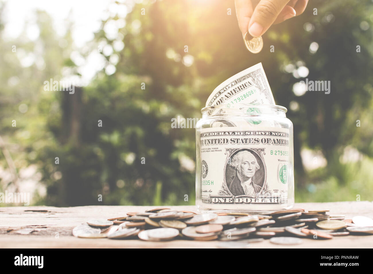 Money jar in nature hi-res stock photography and images - Alamy