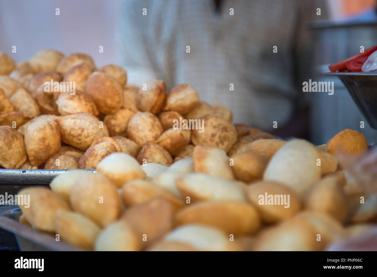 Famous Indian street food gol gappe or pani puri. Chat item Selling in ...