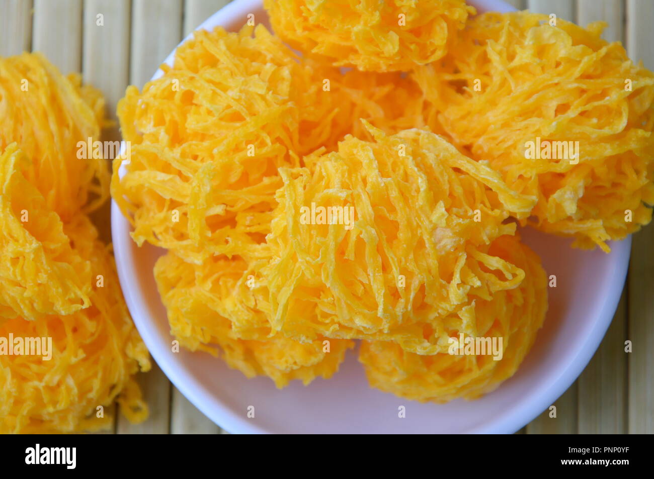 Golden egg yolk threads hi-res stock photography and images - Alamy