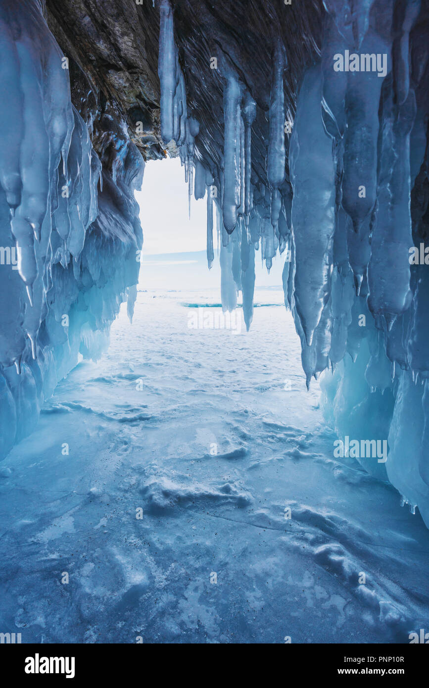 Winter frozen ice cave at frozen lake Baikal in Siberia, Russia Stock ...