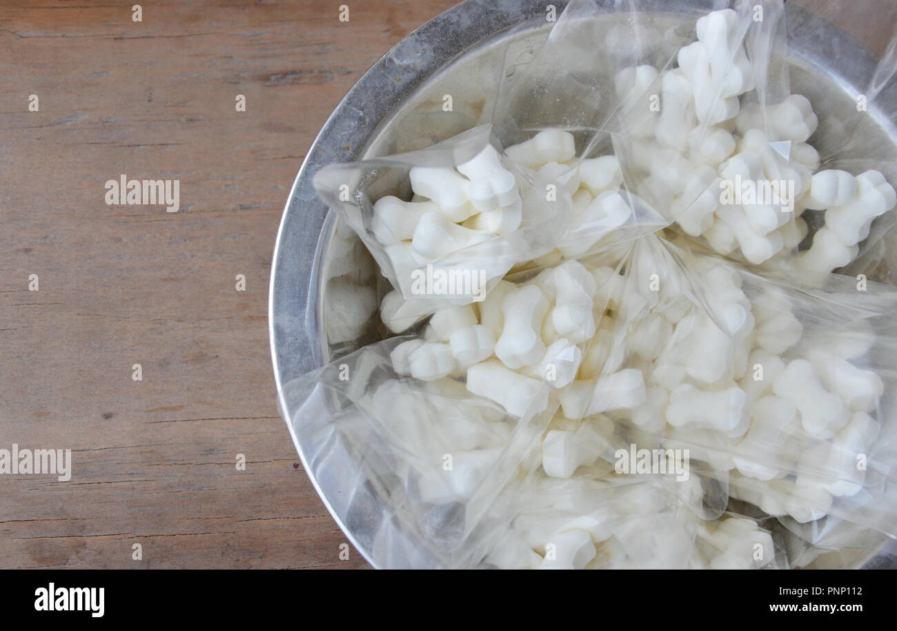 goat milk pallet for feeding pet in plastic bag Stock Photo - Alamy