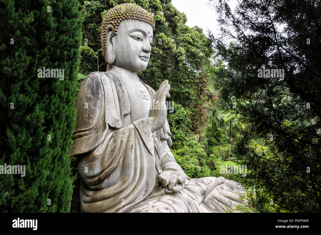 Large stone Buddha statue at Chin Swee Caves Temple, Genting Highland ...