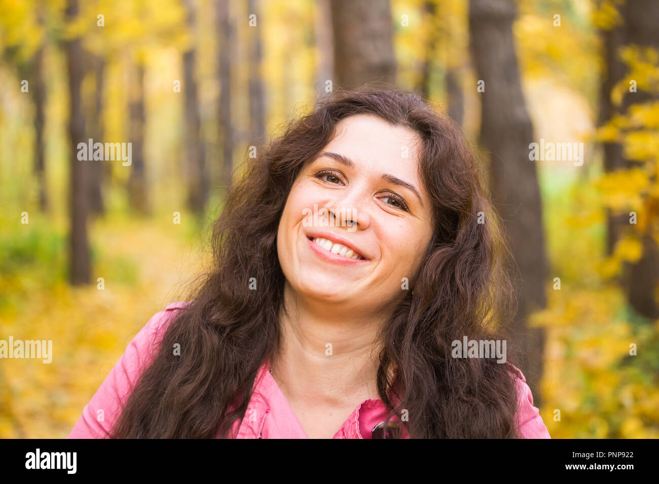 Parks, nature and people concept- Portrait of beautiful smiling woman ...