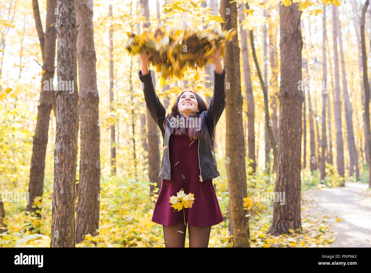 people, season and emotion concept - young pretty smiling woman have ...