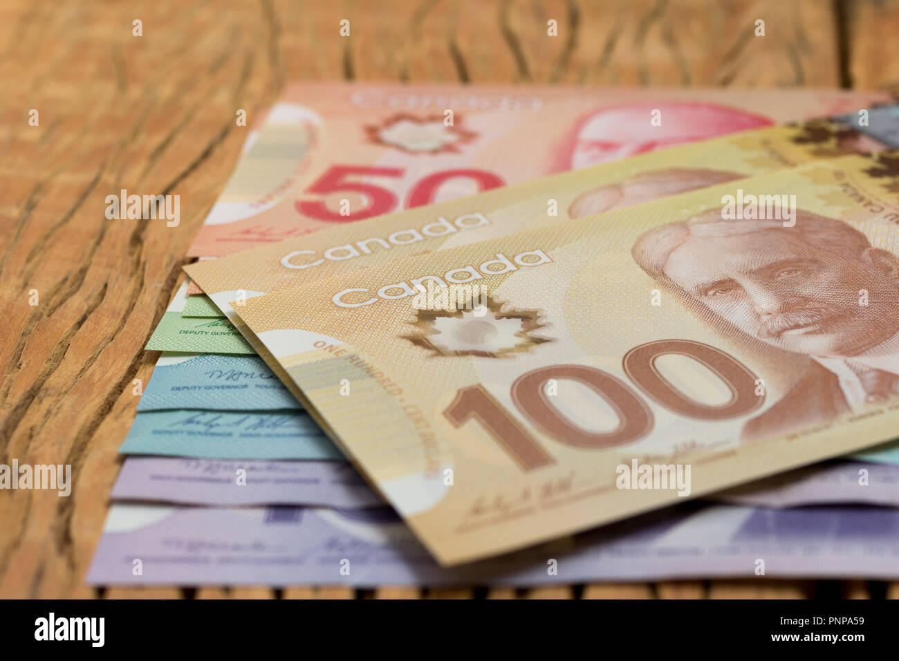 Canada money pile hi-res stock photography and images - Alamy