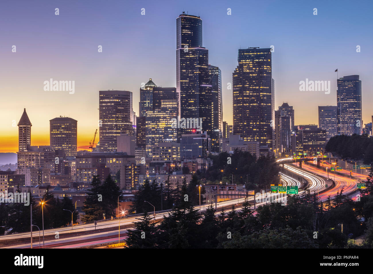 A long exposure of the Seattle skyline with car light trails Stock ...