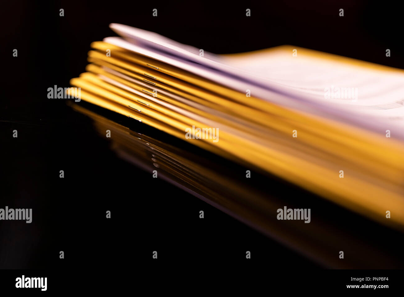 Stack of music on the surface of a grand piano Stock Photo - Alamy